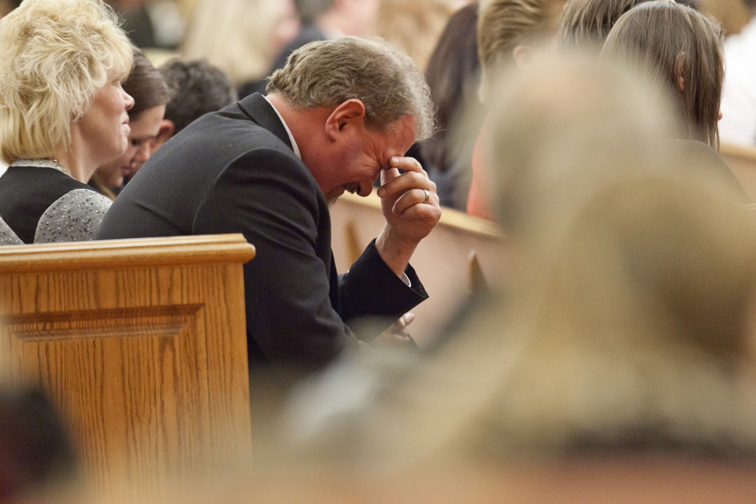 Mourners remember family taken away ‘so fast and so unforgivable ...